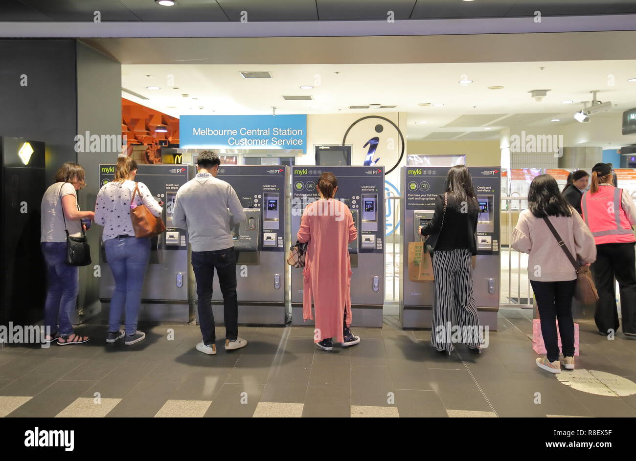 People recharge Myki transportation card at Melbourne Central train ...