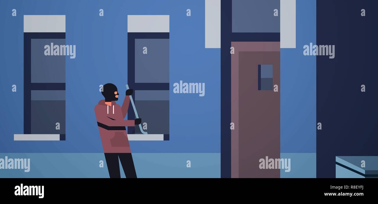 burglar in black mask using crowbar breaking entering into home ...