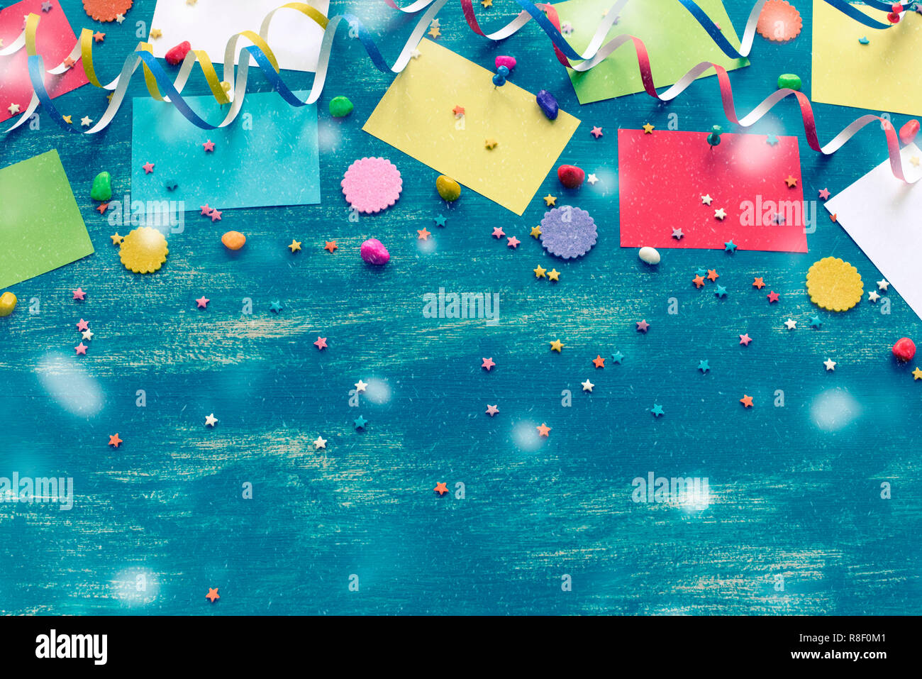 Festive bright blue background decoration for holiday colored confetti ...