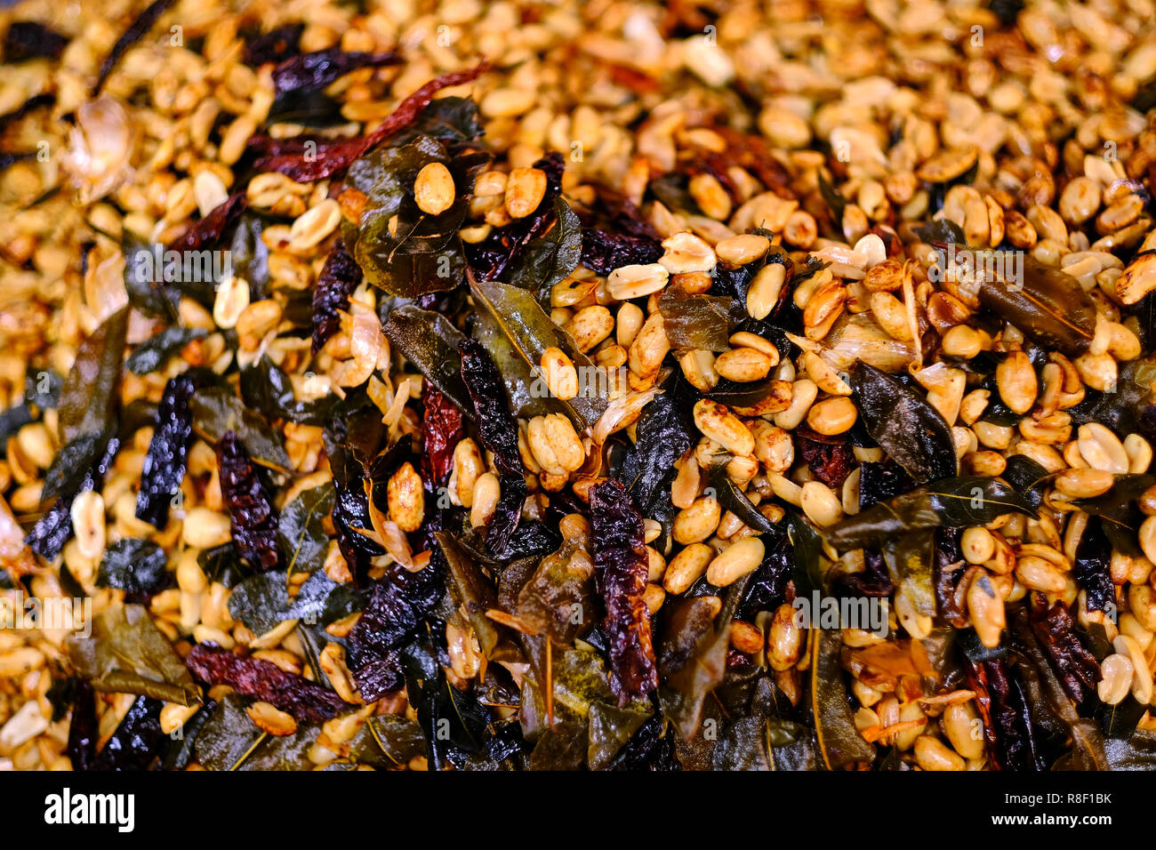 Fried peanut with chilly pepper - traditional asian street food. Asian ...