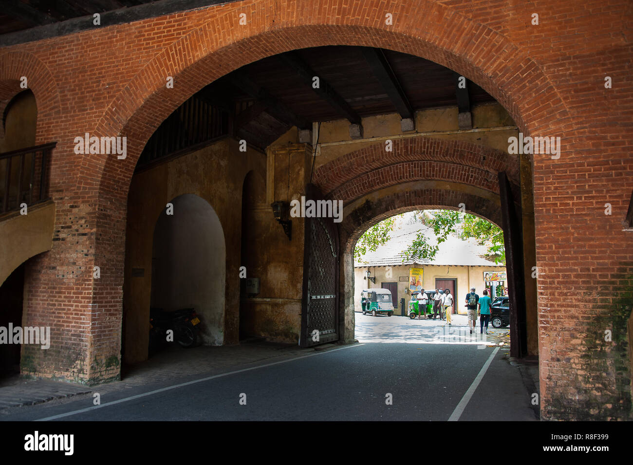View through the old Dutch gate of the Galle Fort, Sri Lanka. Red brick ...