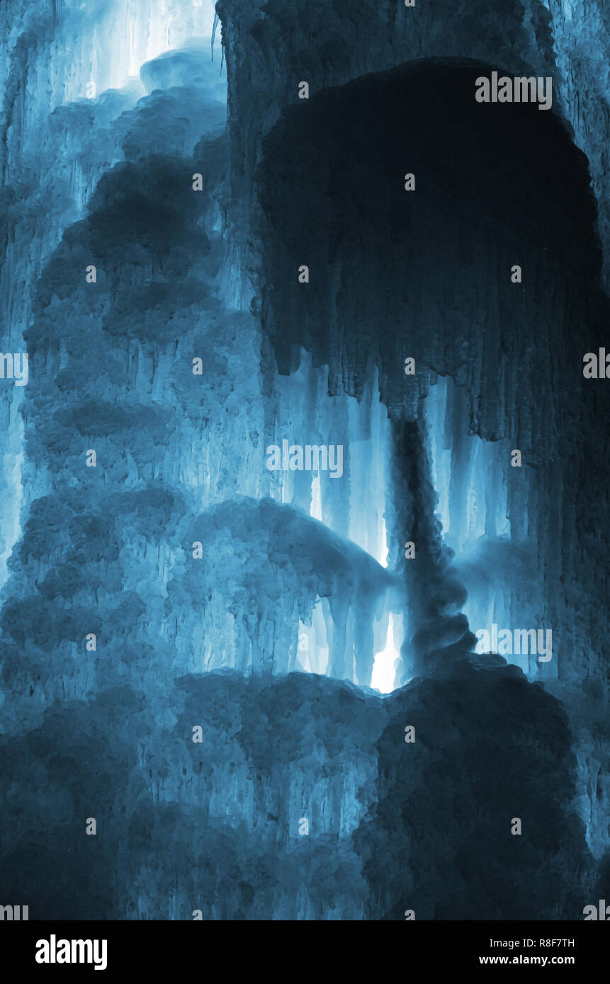 Huge ice icicles. Large blocks of ice frozen waterfall or water. Blue ...