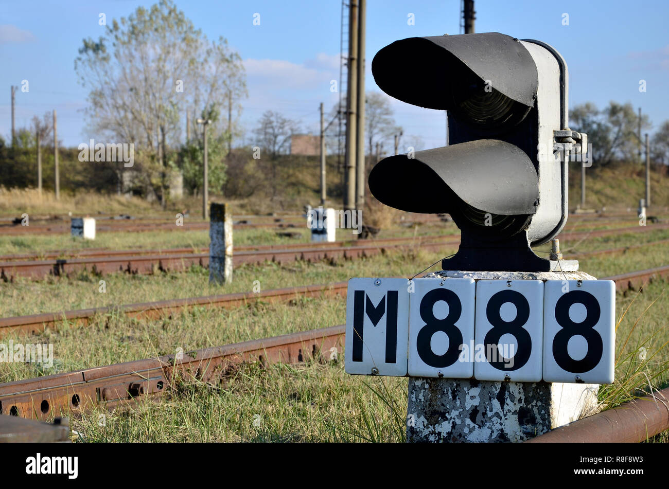 Railway landscape. Railroad sign with the sunny railway background and ...