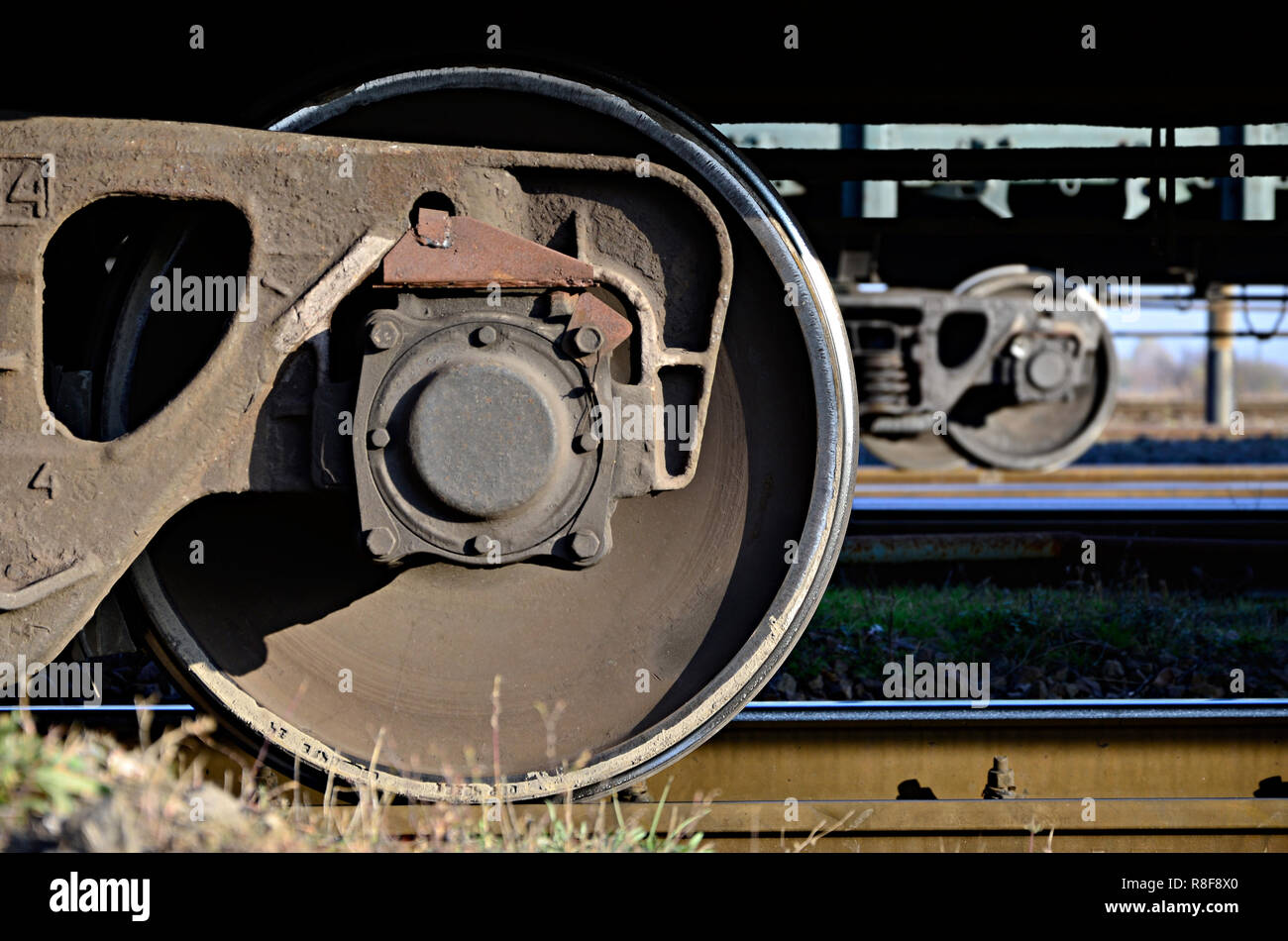 Detailed photo of railway freight car. A fragment of the component ...