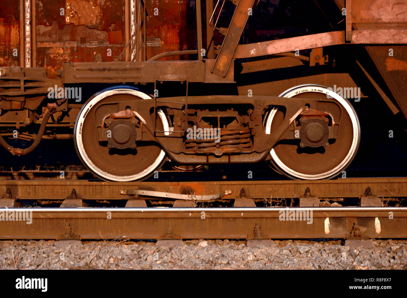 Detailed photo of railway freight car. A fragment of the component ...