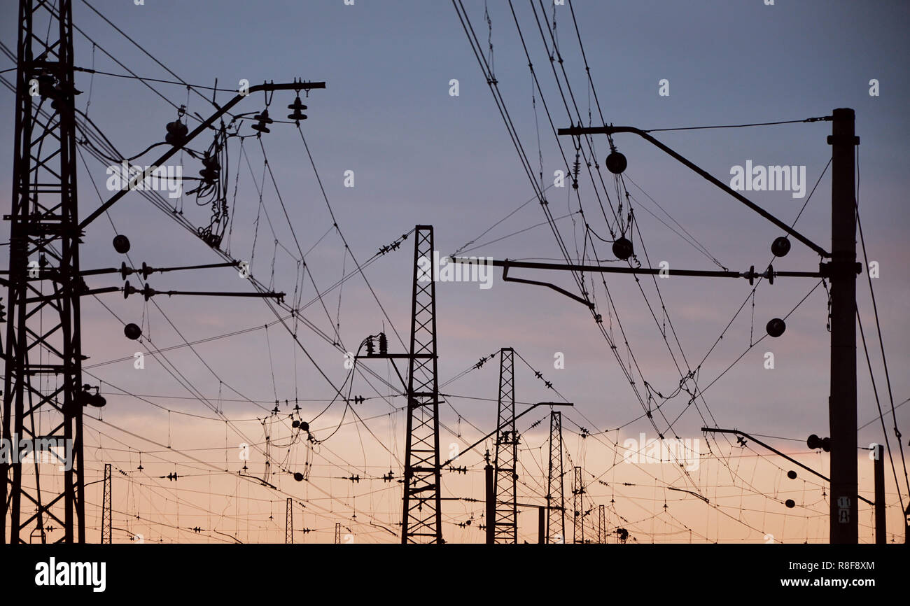 Railroad overhead lines against clear blue sky, Contact wire. High ...