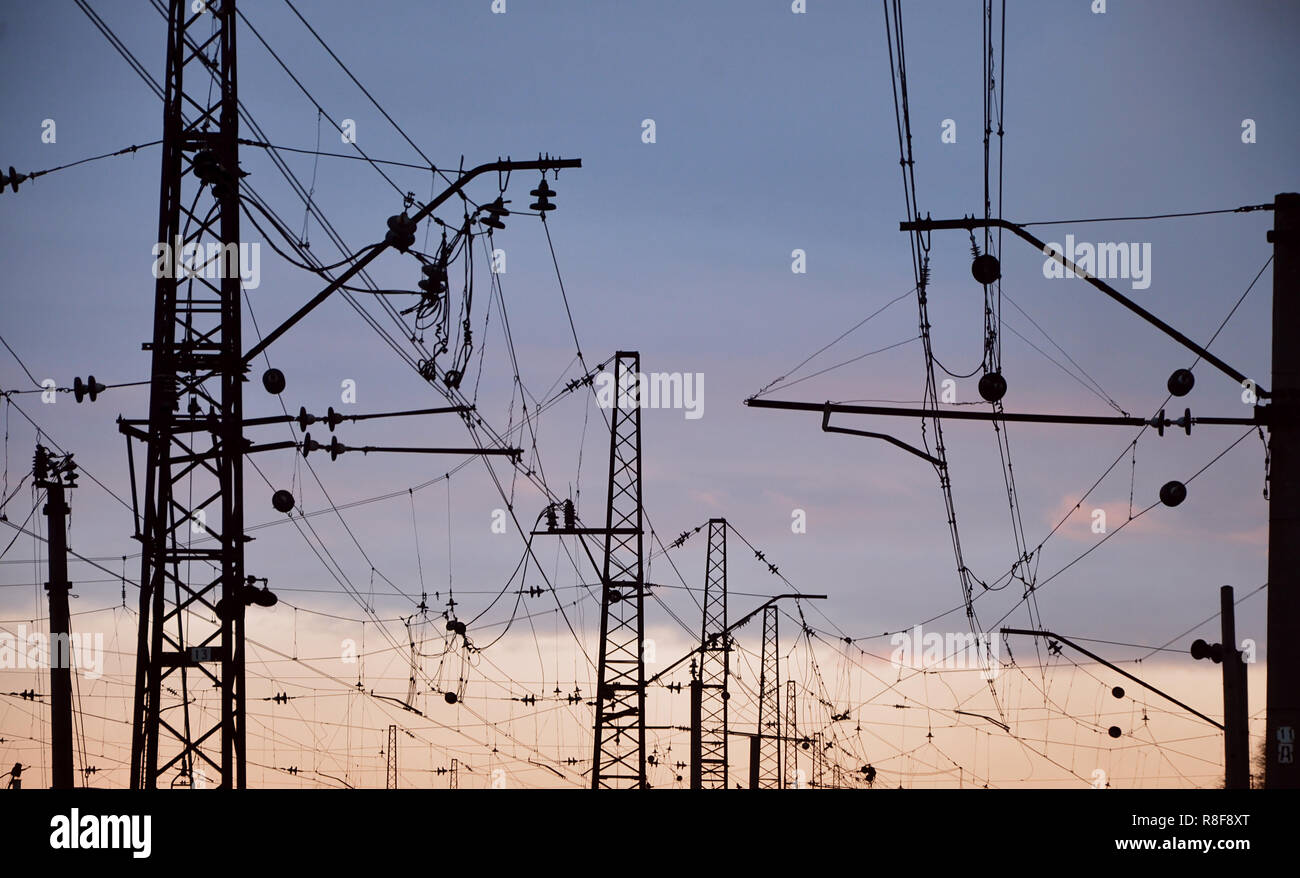 Railroad overhead lines against clear blue sky, Contact wire. High ...