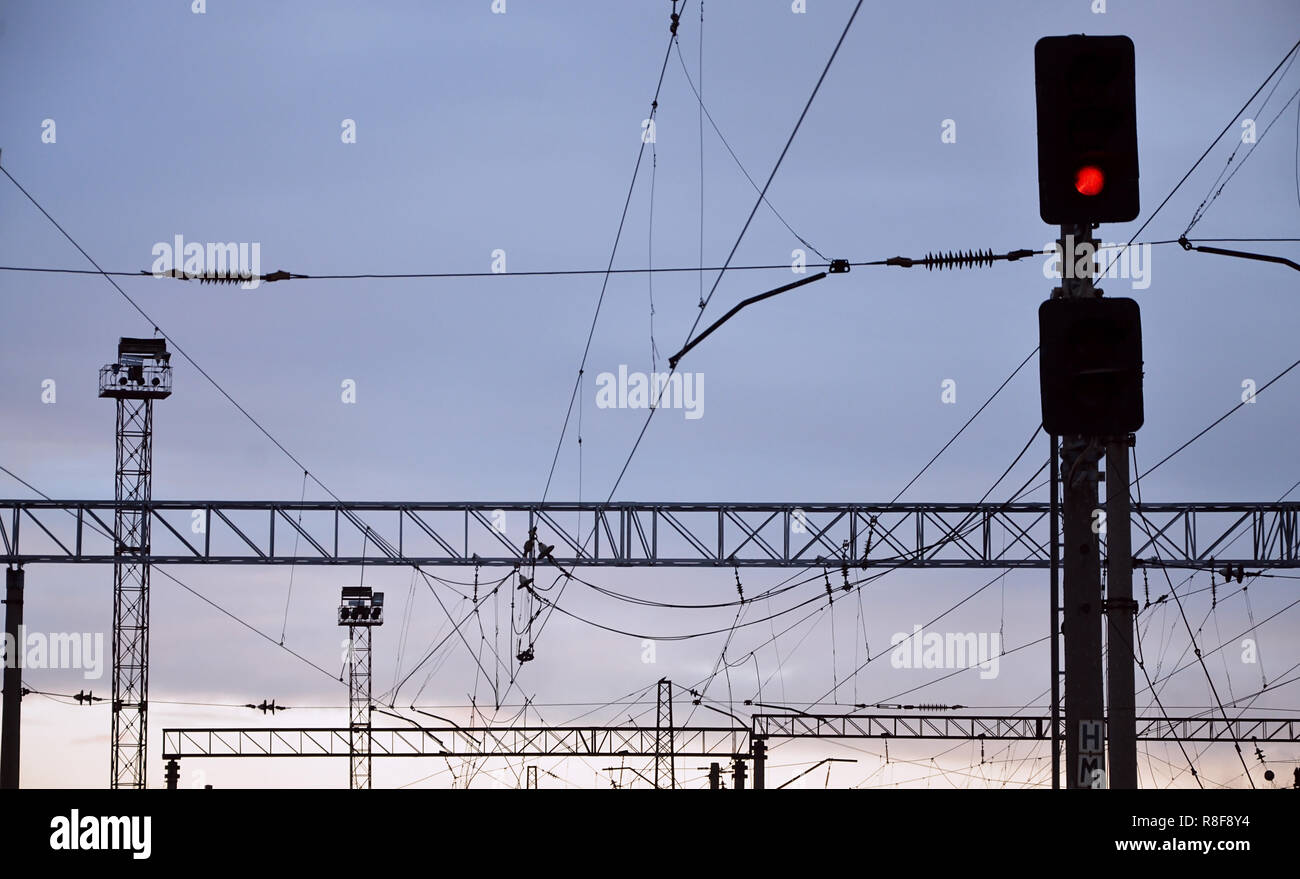 Railroad traffic light against clear blue sky, Contact wire. High ...