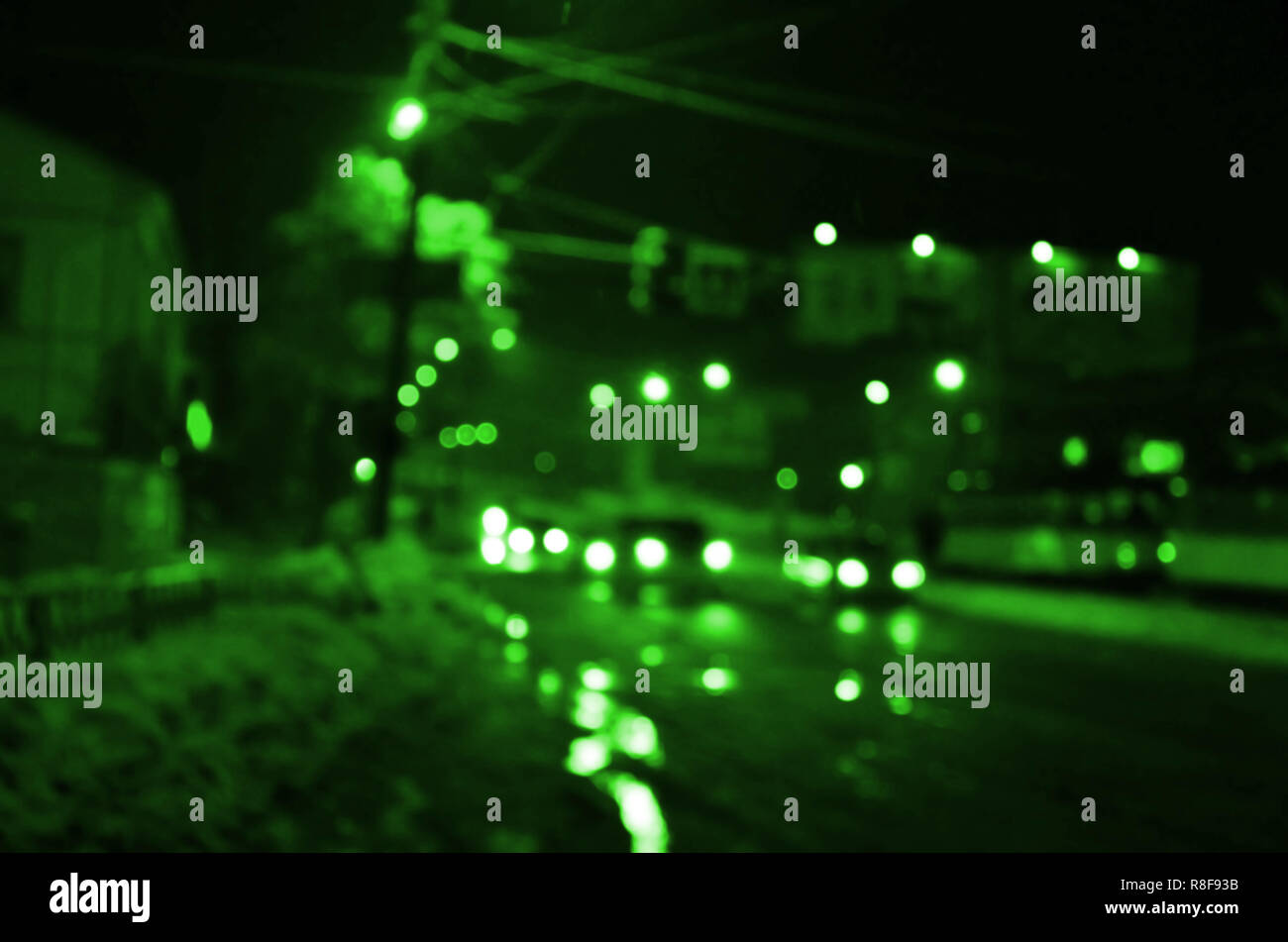 Blurred Defocused Lights of Traffic on a Wet Rainy City Road at Night ...