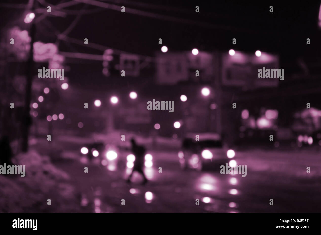 Blurred Defocused Lights of Traffic on a Wet Rainy City Road at Night ...