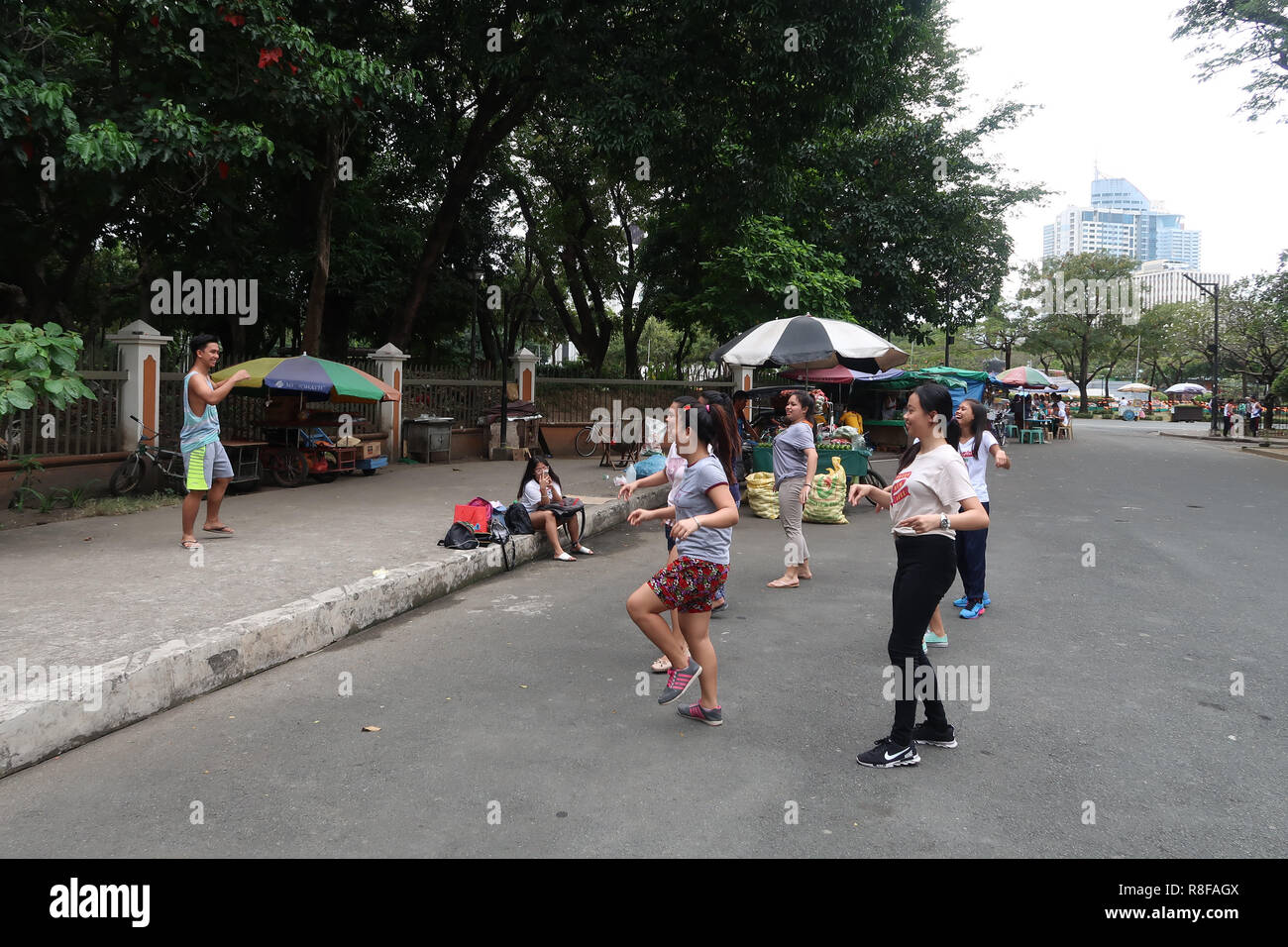 A group of young Filipinos teenagers training to perform flash mob in ...