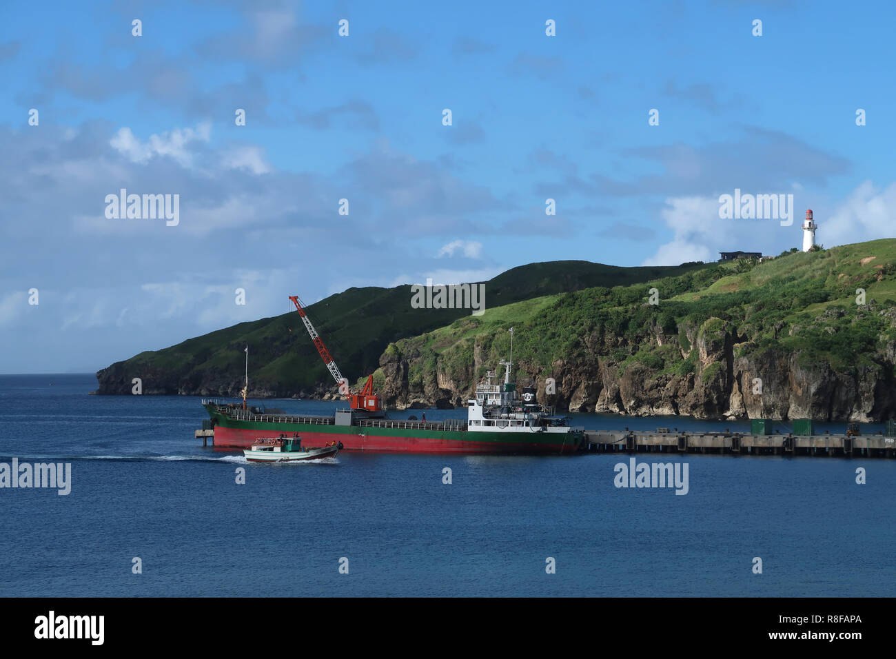 A cargo ship moored at the bay of Batan the main island of Batanes the ...