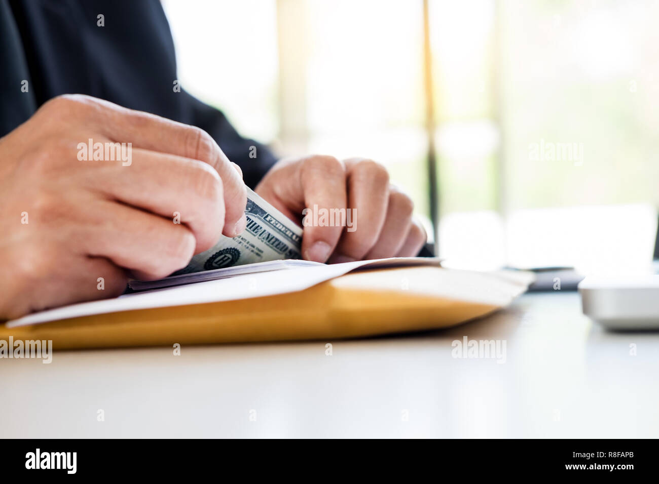 business man counting money at the table, accounting concept Stock ...