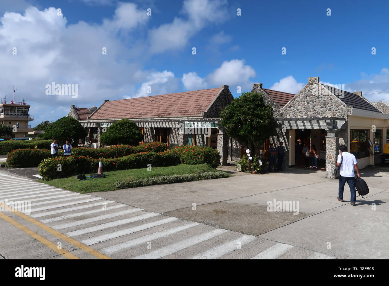 Passenger enter the small Basco airport in Batan the main island of ...