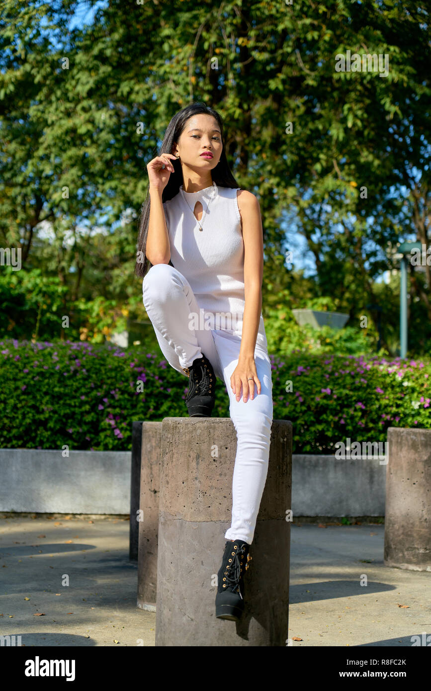 Beautiful woman posing - sitting, tired and contemplation Stock Photo ...