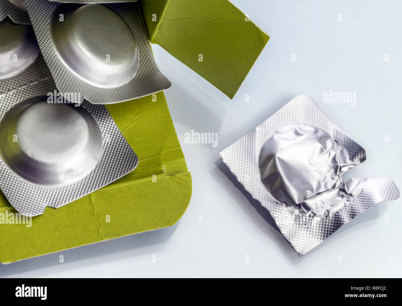 Blister pack of pills isolated on white background Stock Photo - Alamy