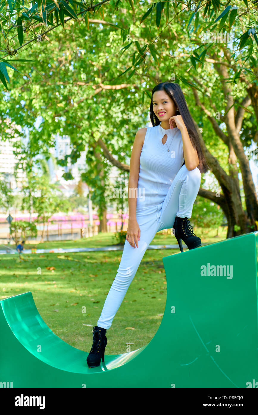 Beautiful woman posing - standing and smile face Stock Photo - Alamy