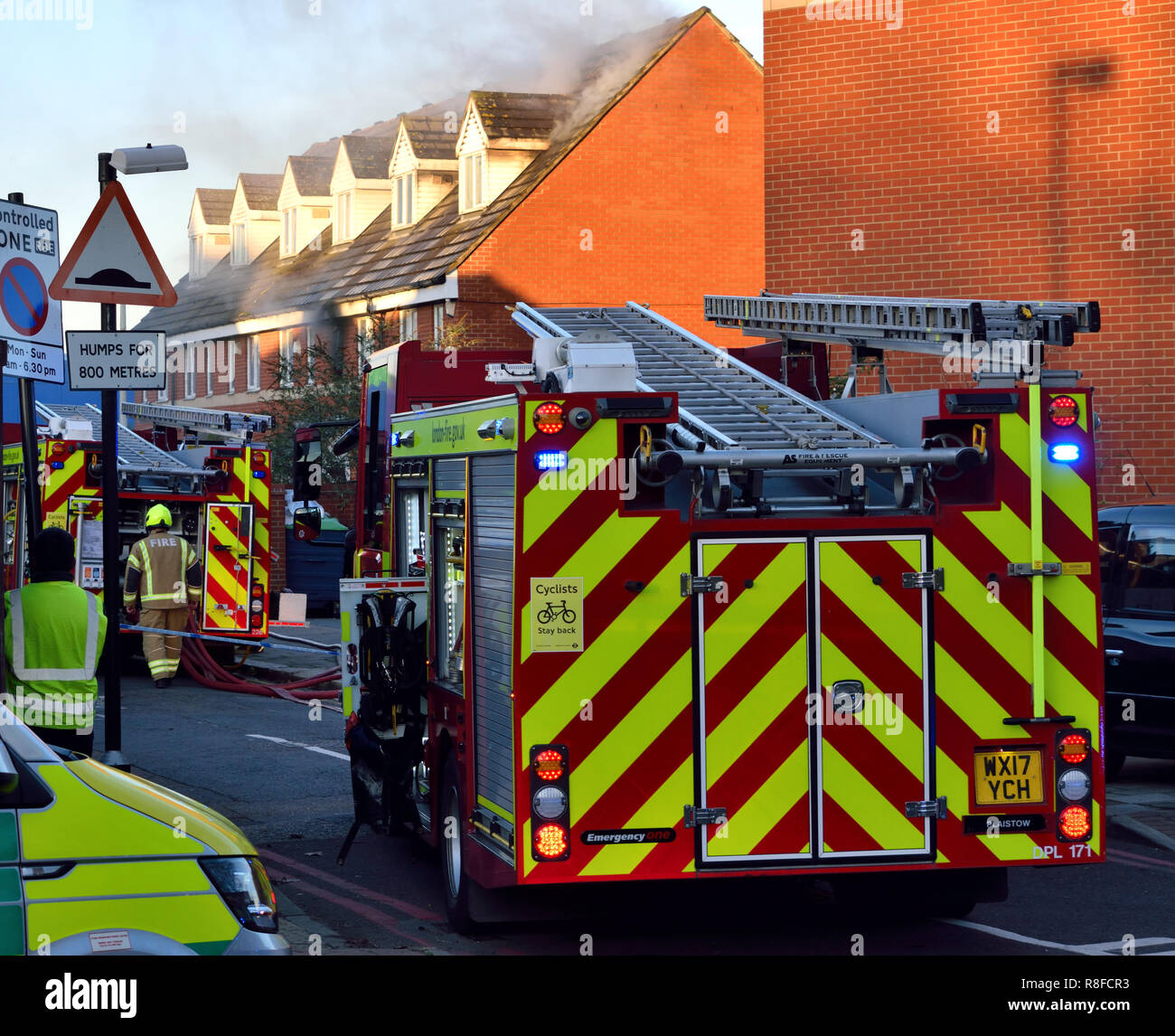 Emergency services respond to a house fire in a residential street in ...