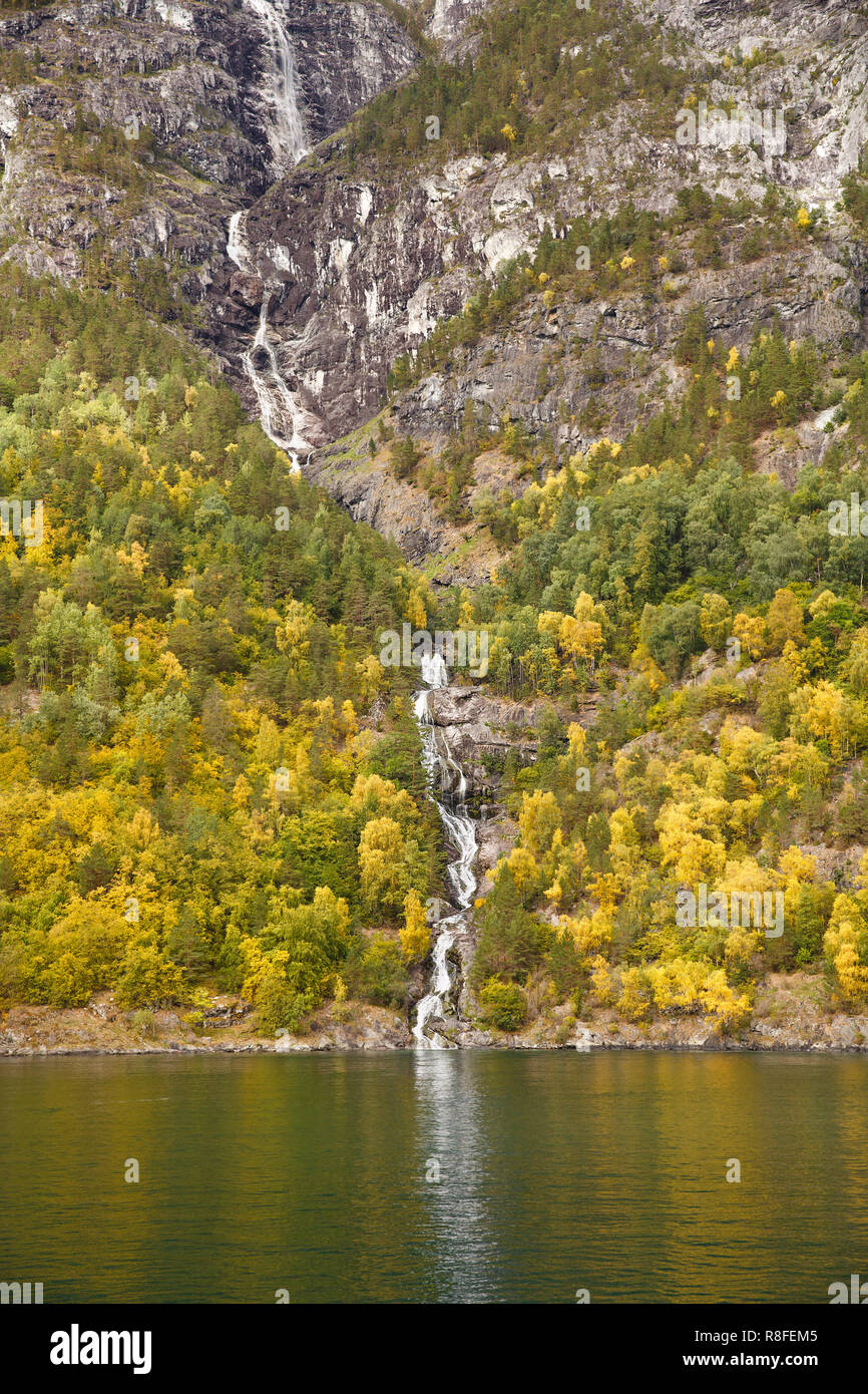 Waterfall and forest with colorful trees in Norway Stock Photo - Alamy