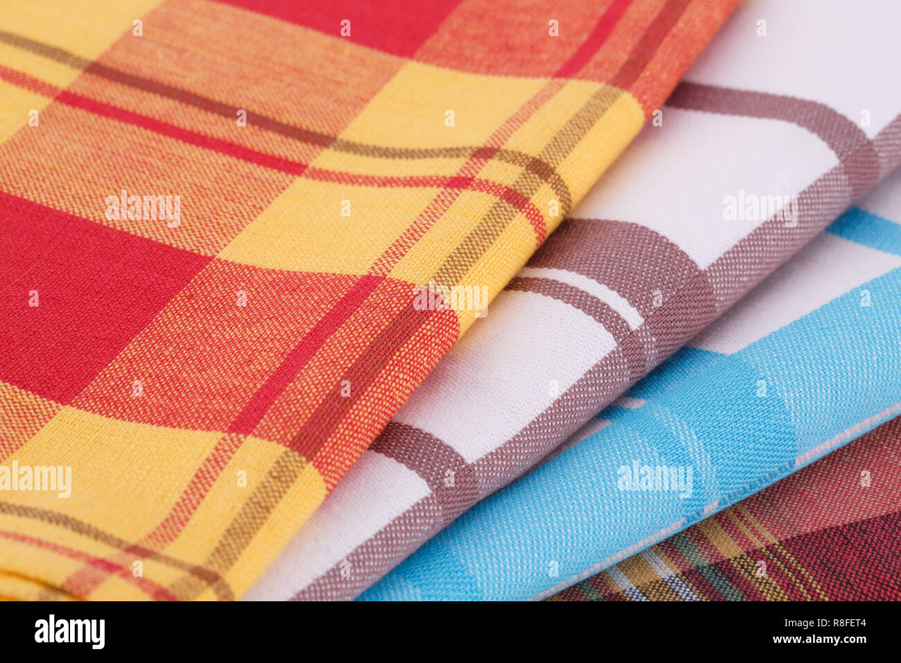 Stack of colorful kitchen towels closeup picture Stock Photo - Alamy