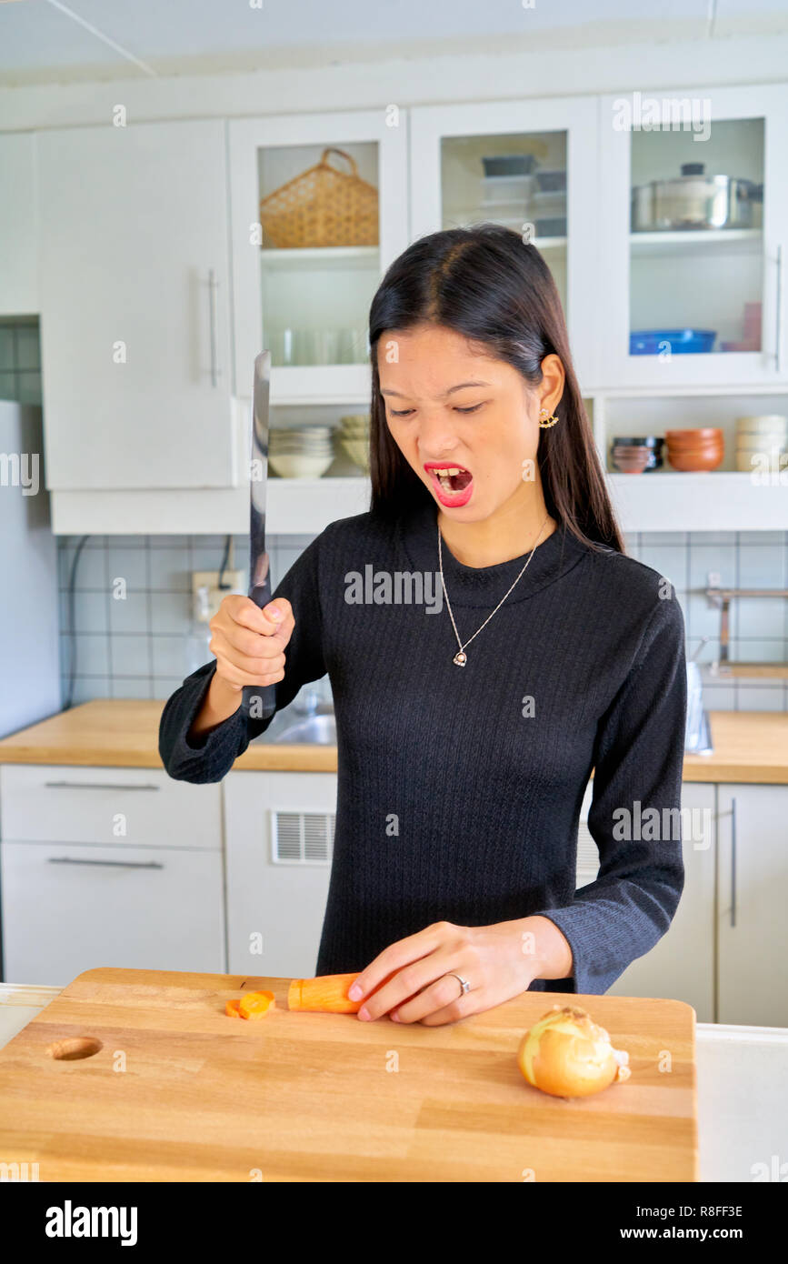 Beautiful woman posing - standing, anger and screaming Stock Photo - Alamy