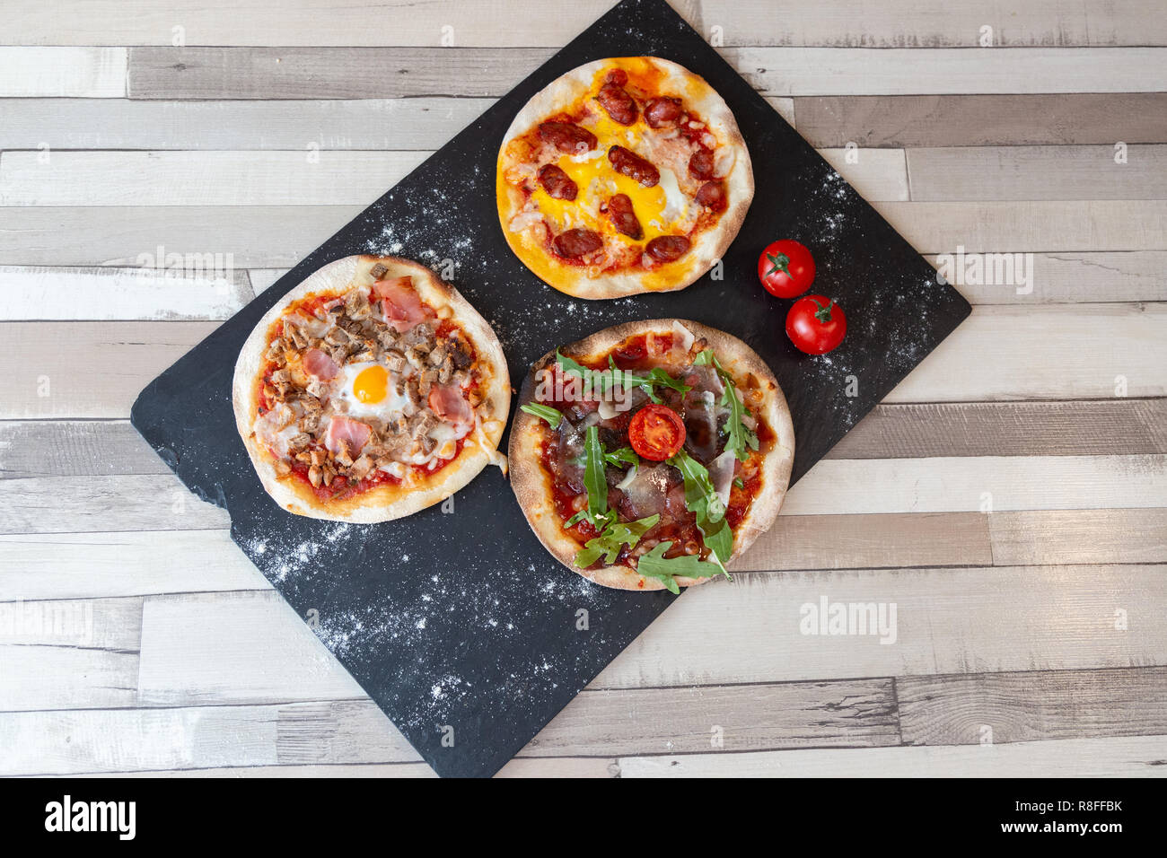 Two different pizza hi-res stock photography and images - Alamy