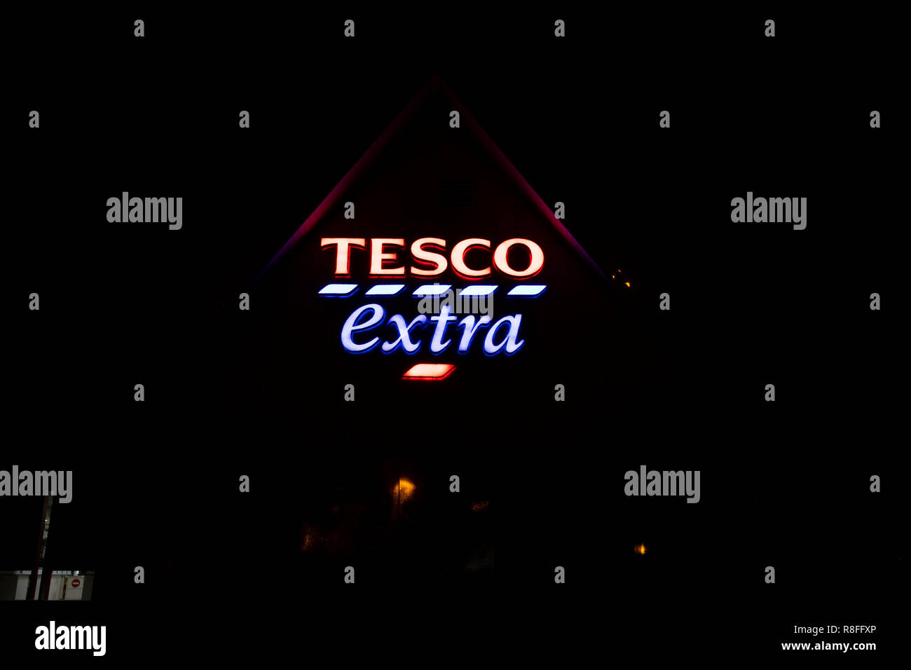 Tesco Extra supermarket neon sign over entrance, British multinational ...
