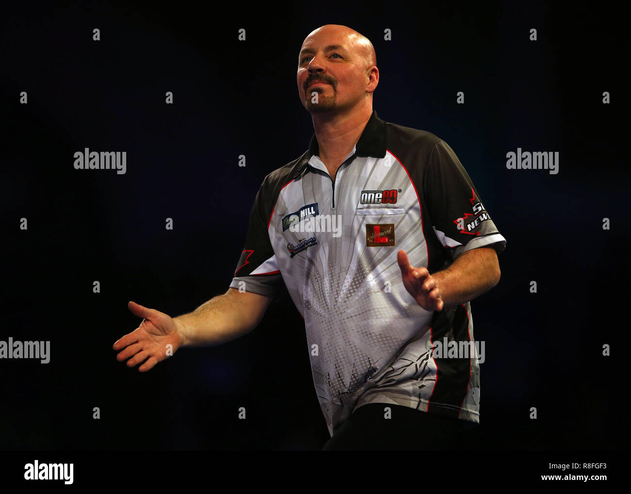 Jim Long reacts during his match against Mickey Mansell during day ...