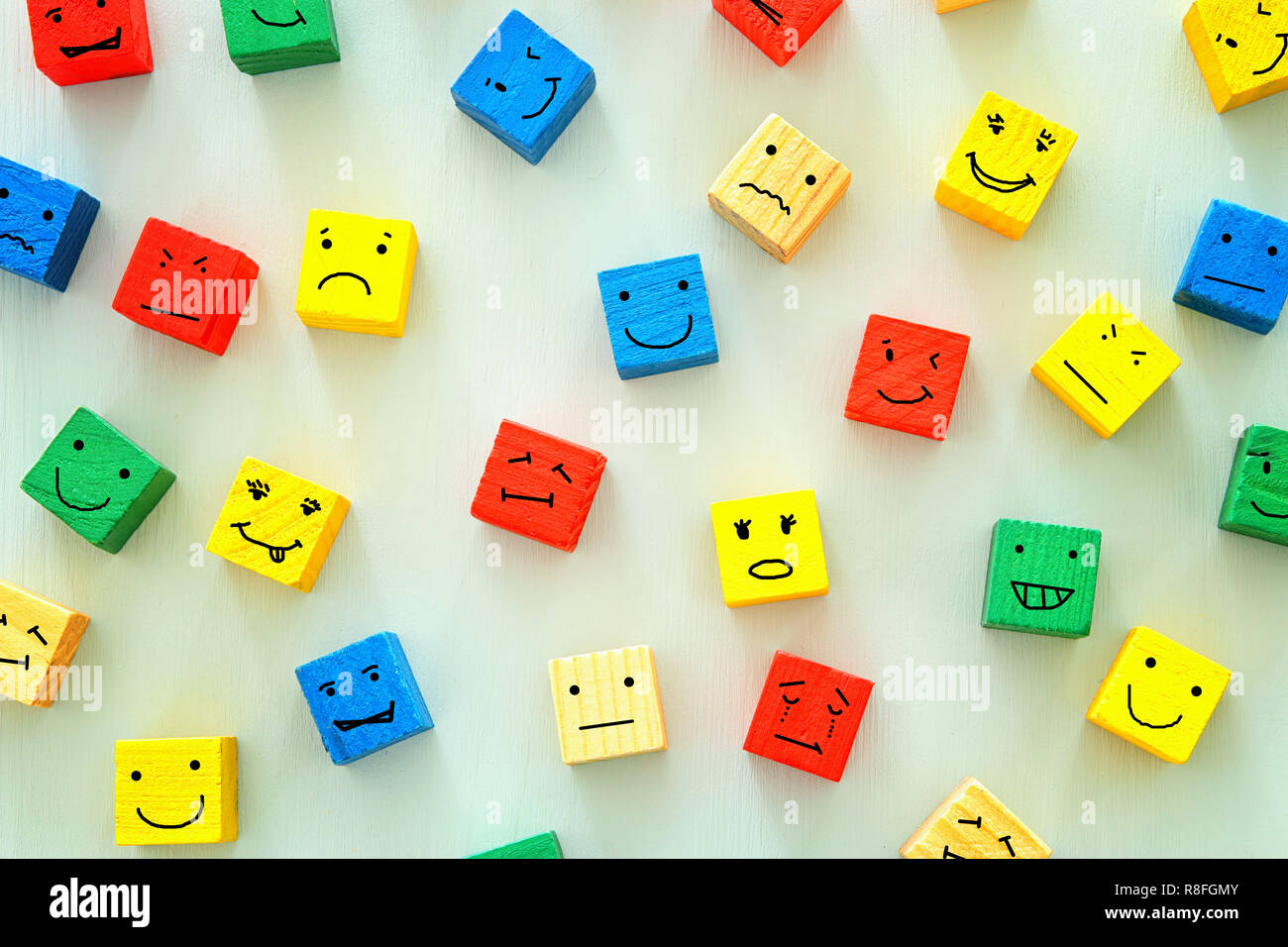 concept of Different emotions drawn on colorfull cubes, wooden ...