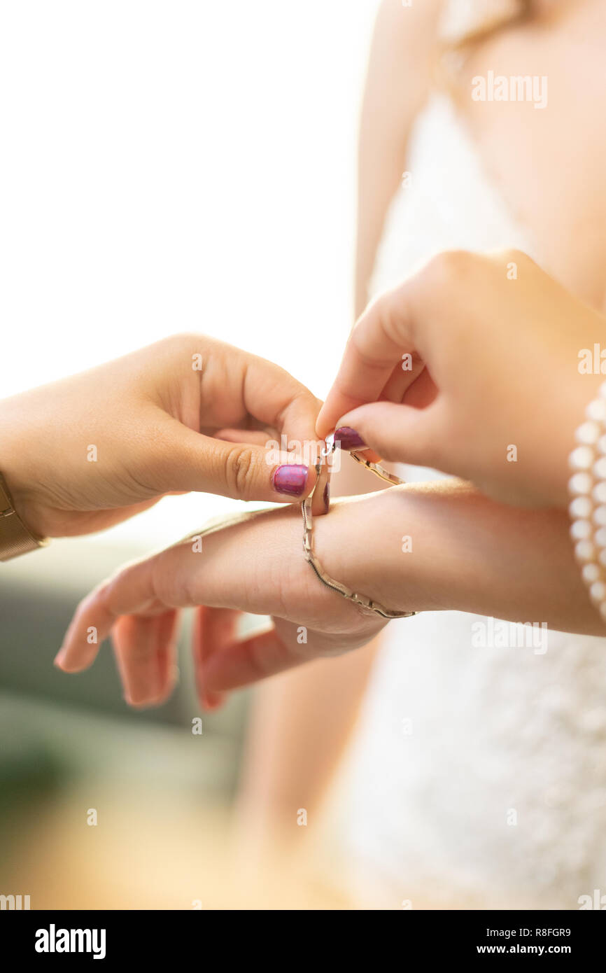 Put on a bracelet hi-res stock photography and images - Alamy