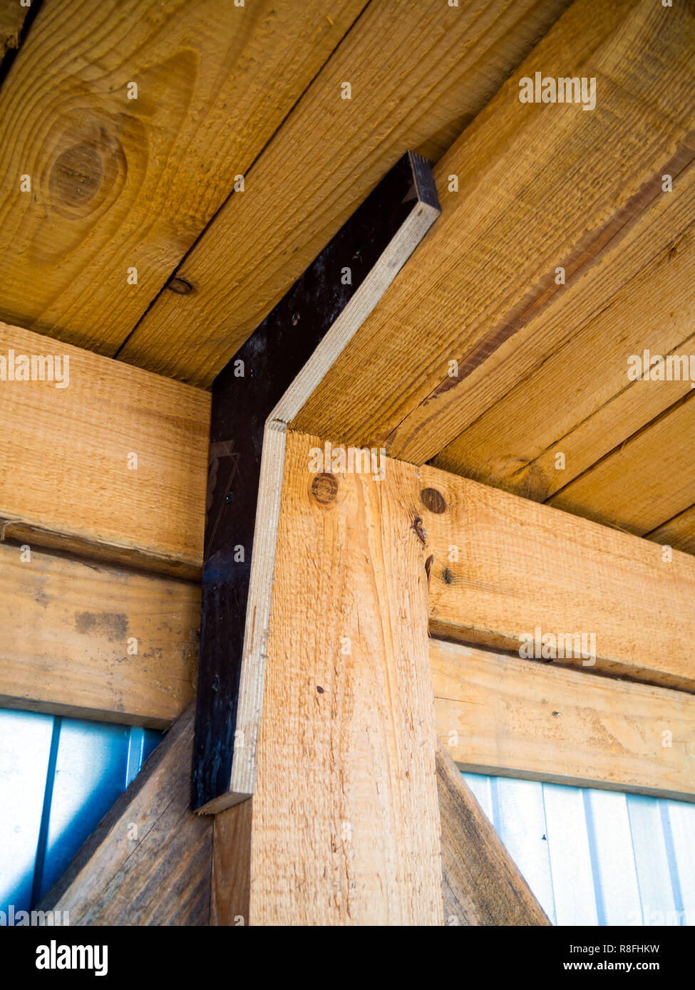 Using a homemade wooden corner when installing a covered transition ...