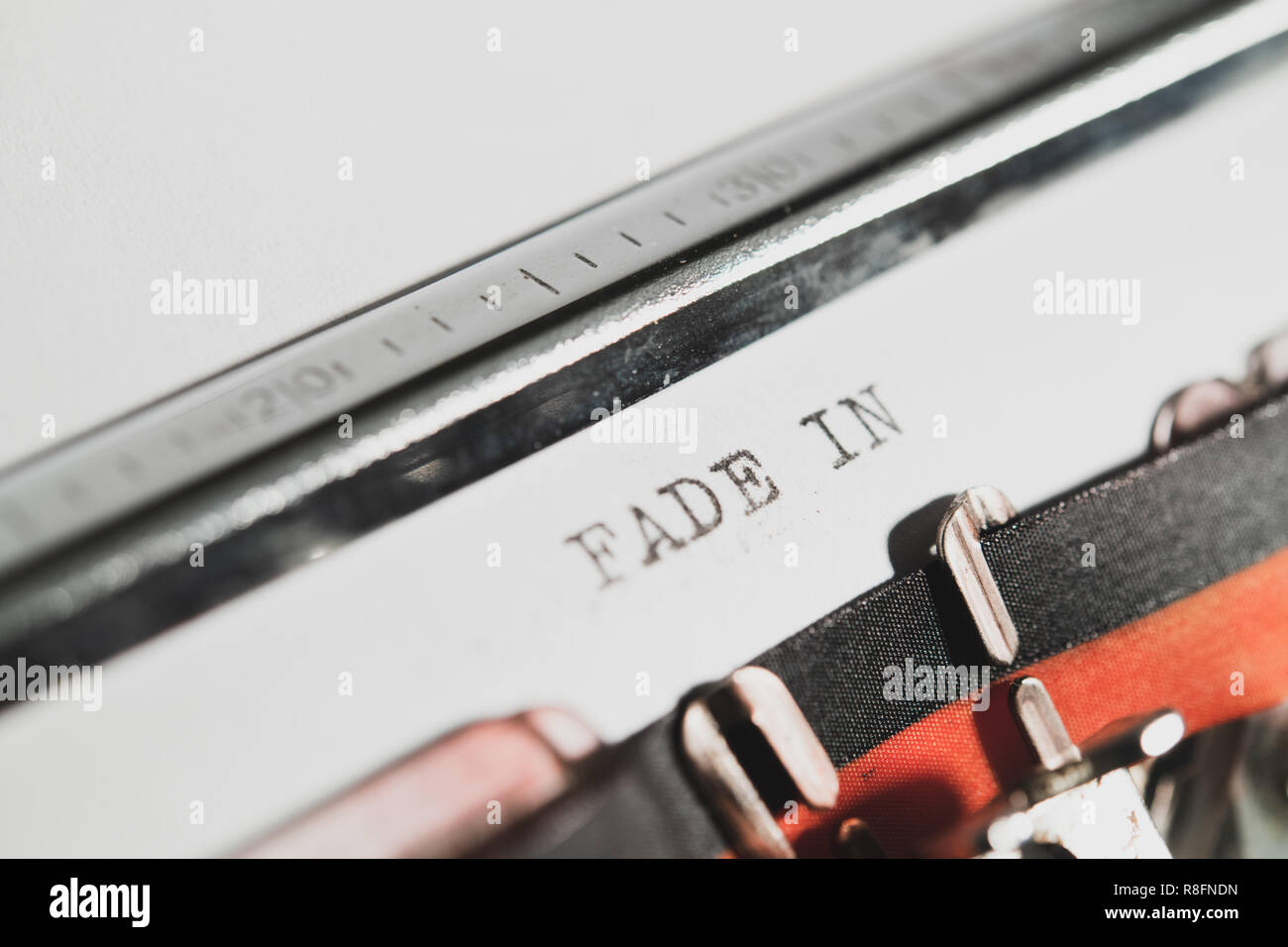 "fade in" text on white paper classic movie script opening close up ...