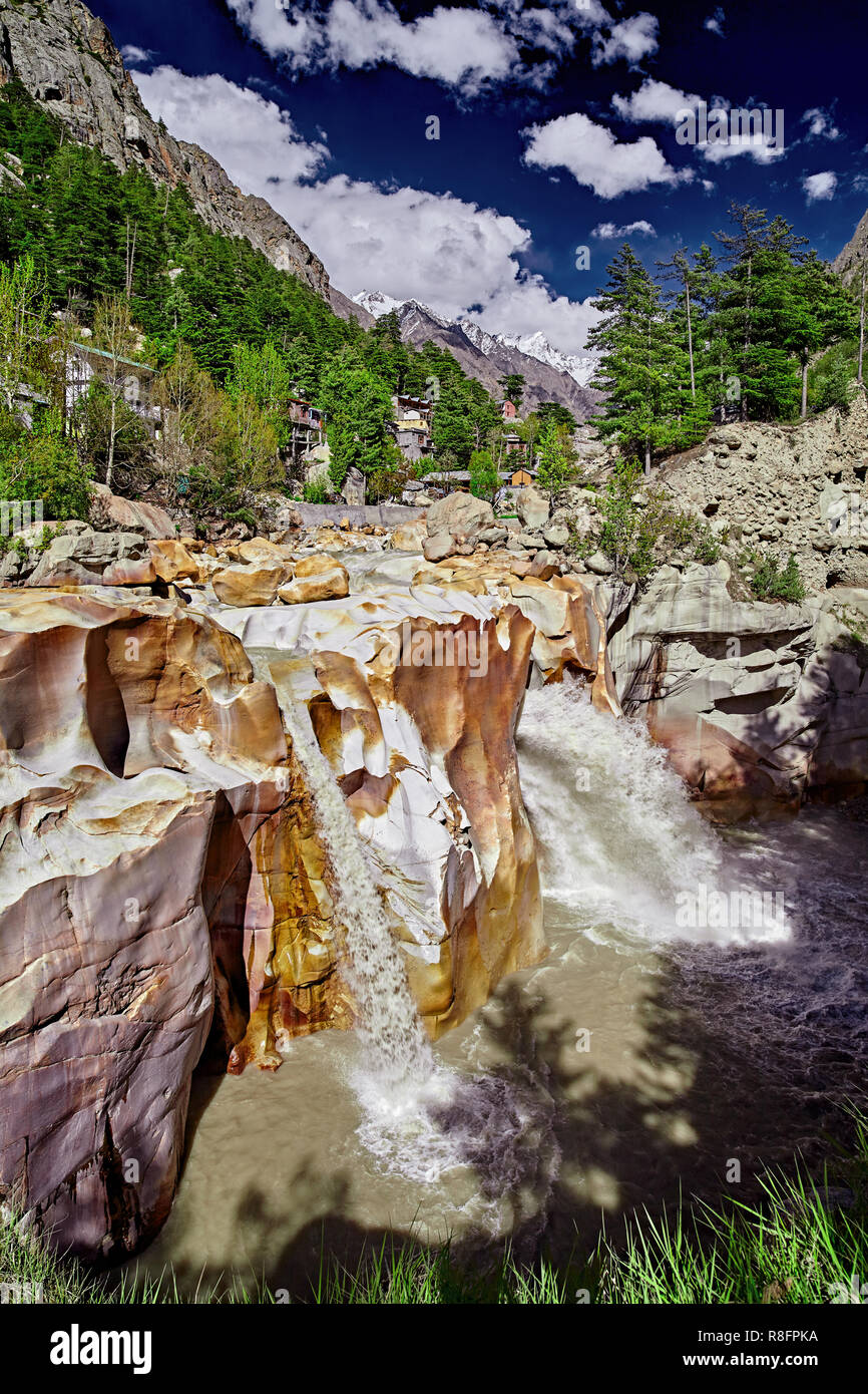 Waterfall of Ganges River flows across the Gangotri town. Uttarakhand ...