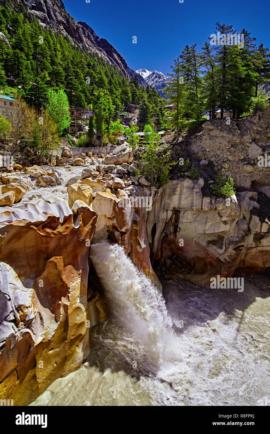 Waterfall of Ganges River flows across the Gangotri town. Uttarakhand ...