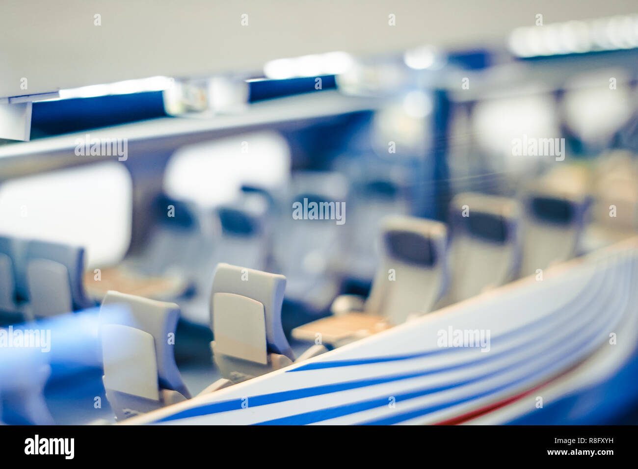 Miniature toy model of modern train crossing bridge Stock Photo - Alamy