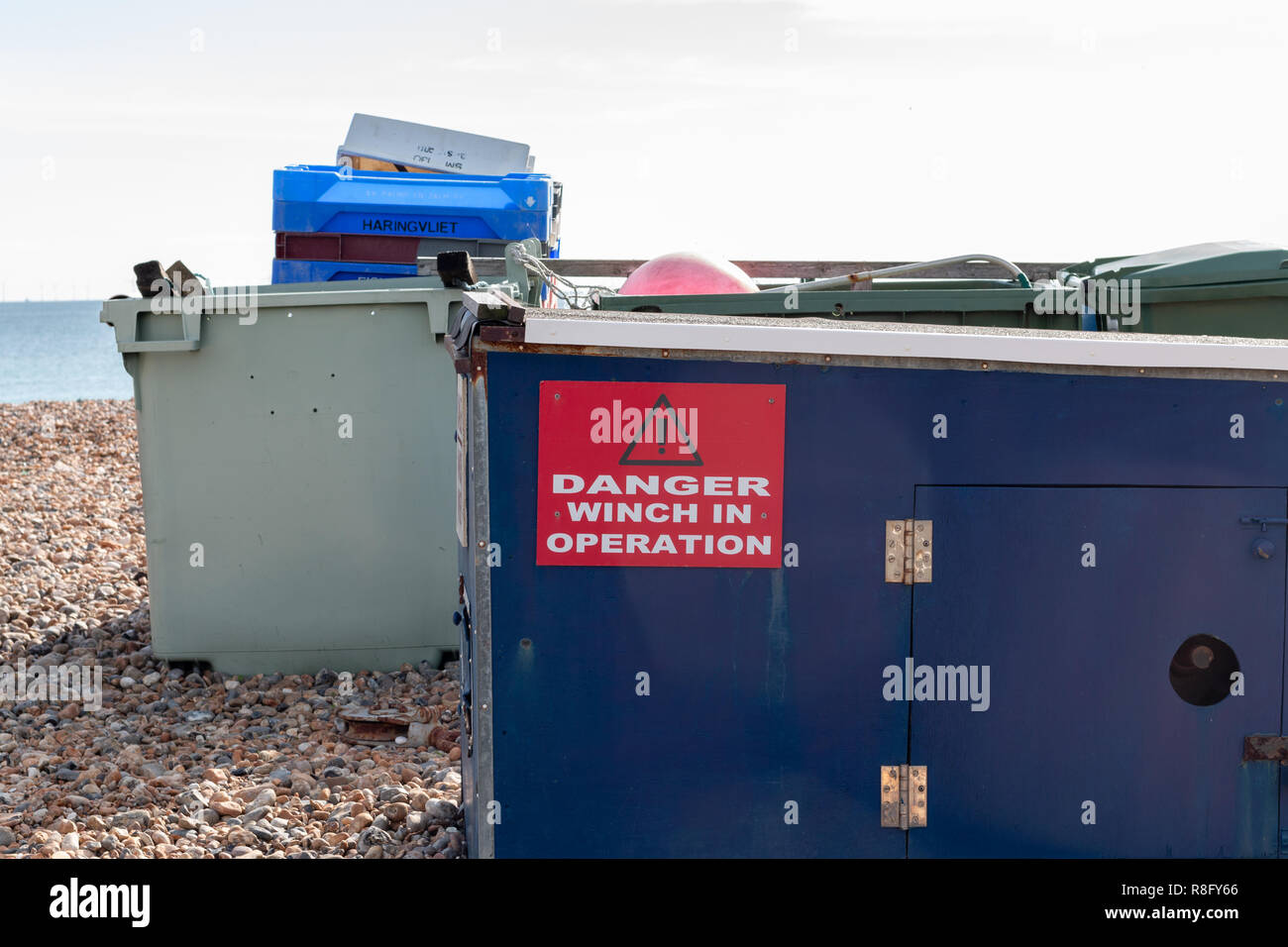 Warning sign for a beach winch used for hauling fishing boats up the ...