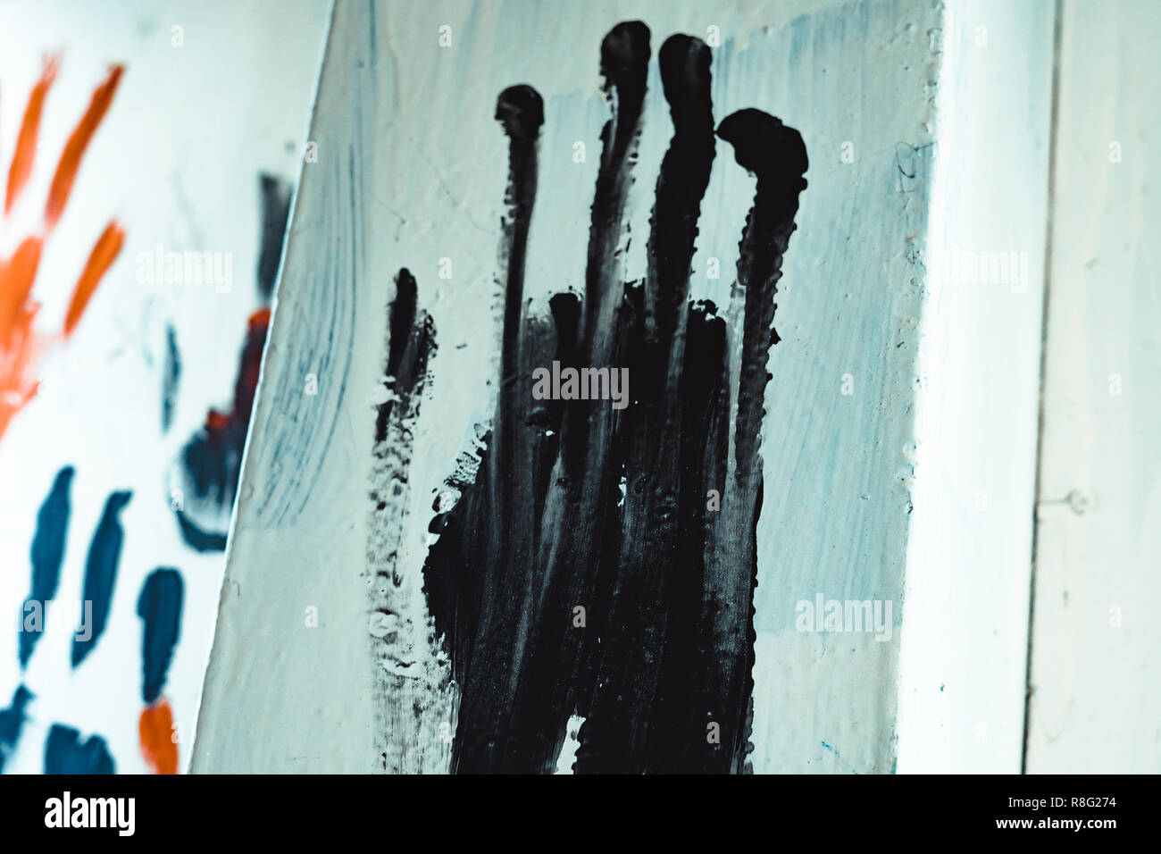 handprint in paint on white wall Stock Photo - Alamy
