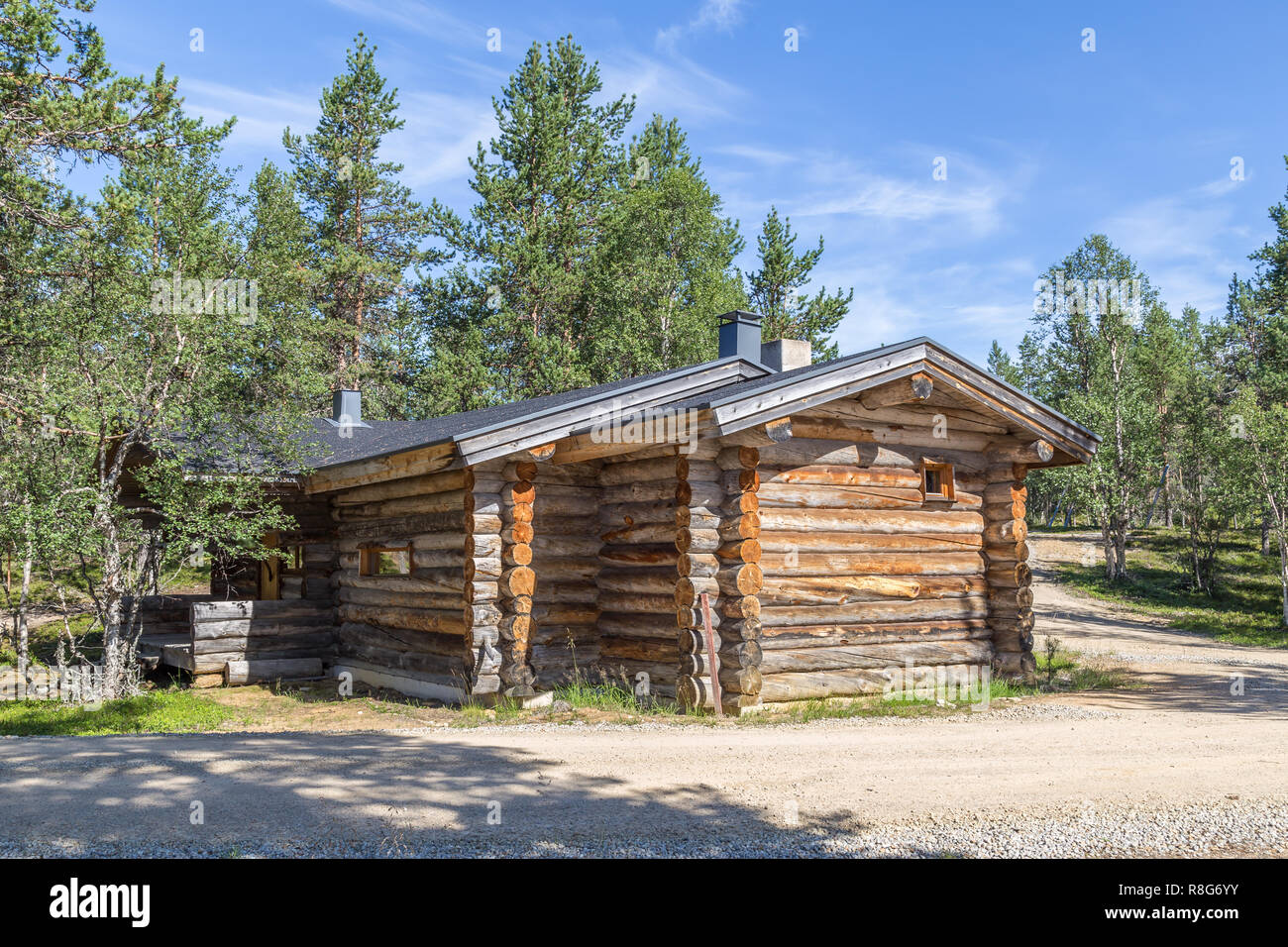 Finnish wooden loghouse in the forest of Lapland Stock Photo - Alamy