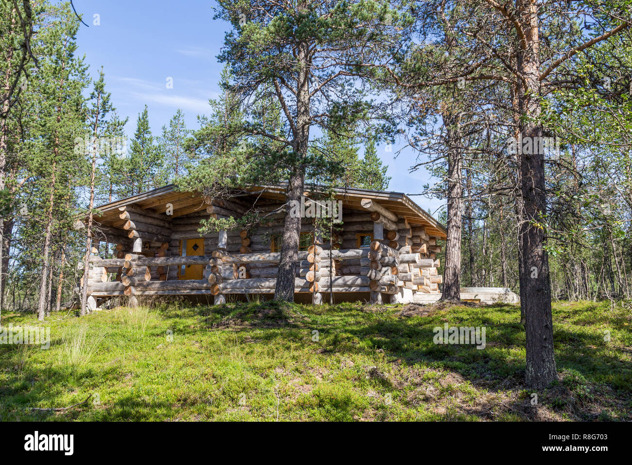 Finnish wooden loghouse in the forest of Lapland Stock Photo - Alamy