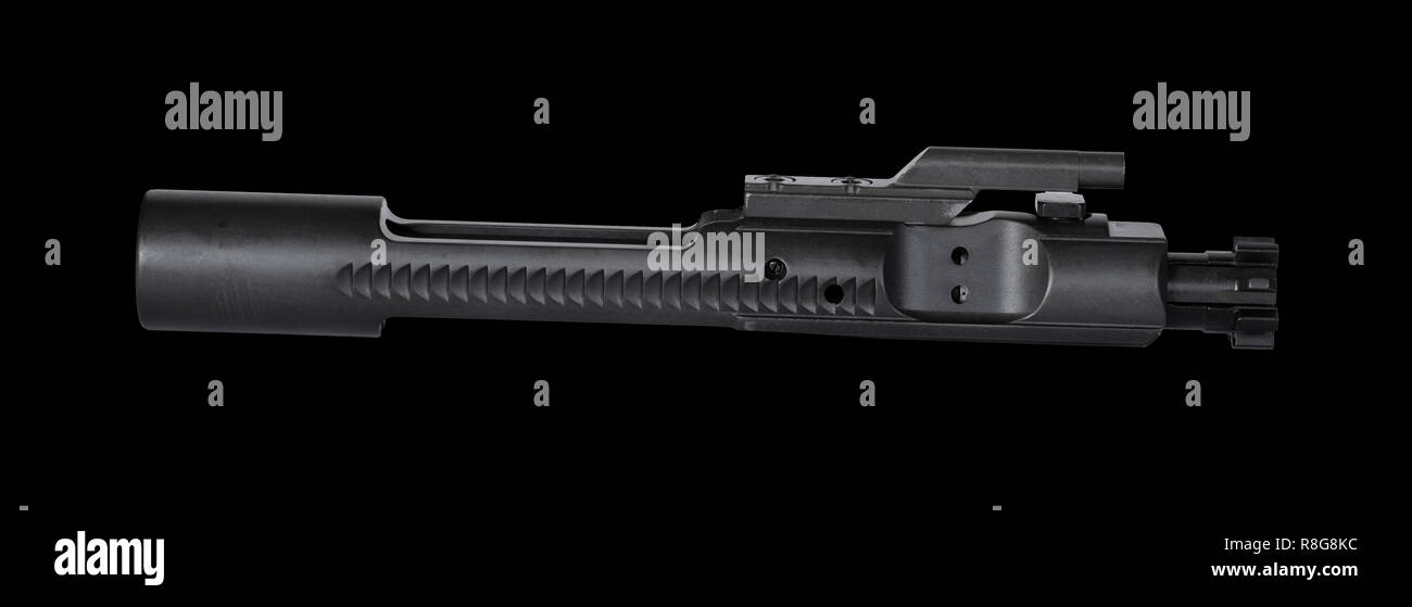 Assault rifle bolt carrier group on a black background Stock Photo - Alamy