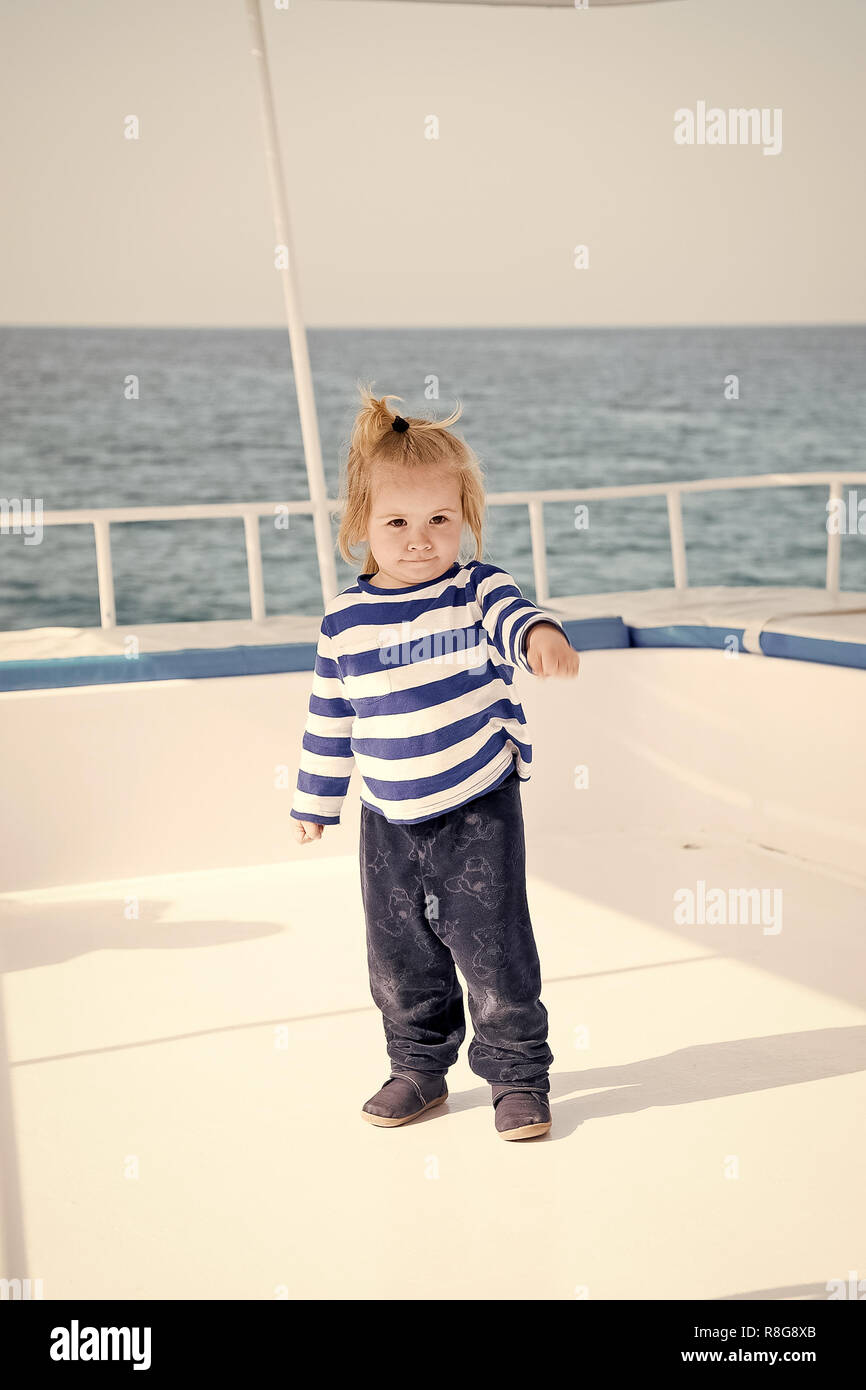traveling, vacation. small baby boy sailor or cute child captain of ...