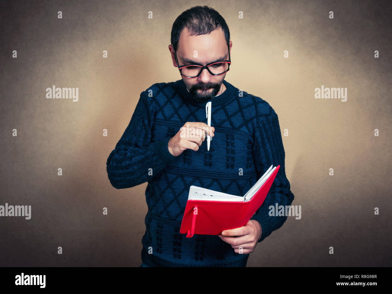 Beard young man thinking writing hi-res stock photography and images ...