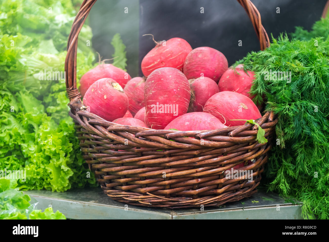 fresh radish in wicker baskets on the counter of market Stock Photo - Alamy