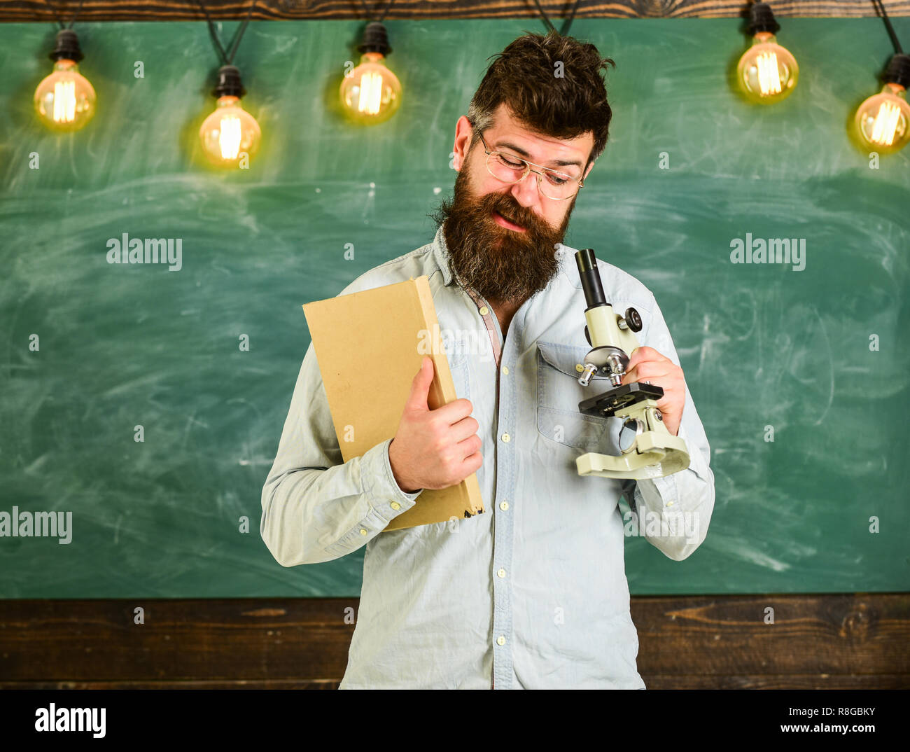 Man with beard and mustache on busy face. Scientific research concept ...