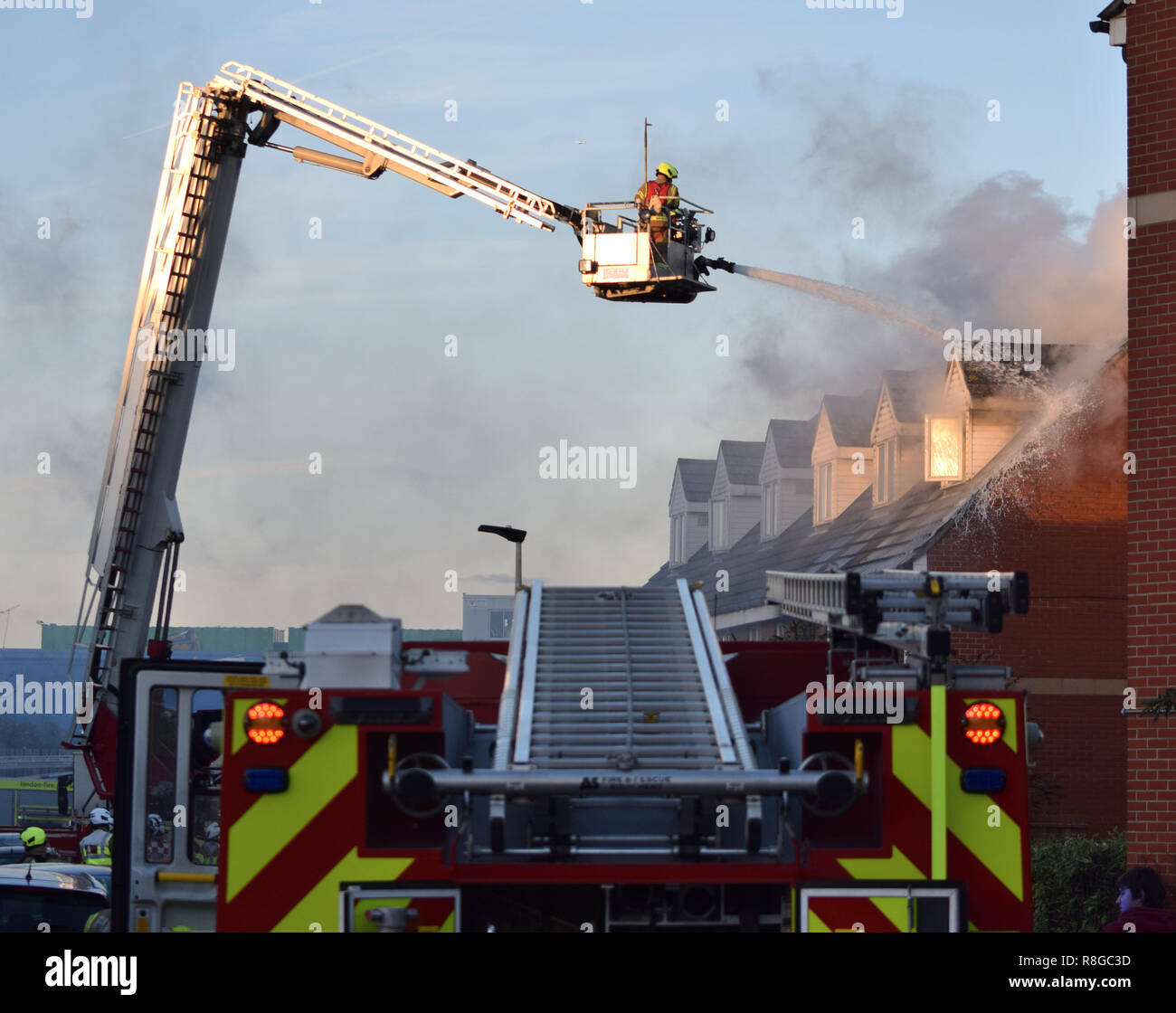 Emergency services respond to a house fire in a residential street in ...