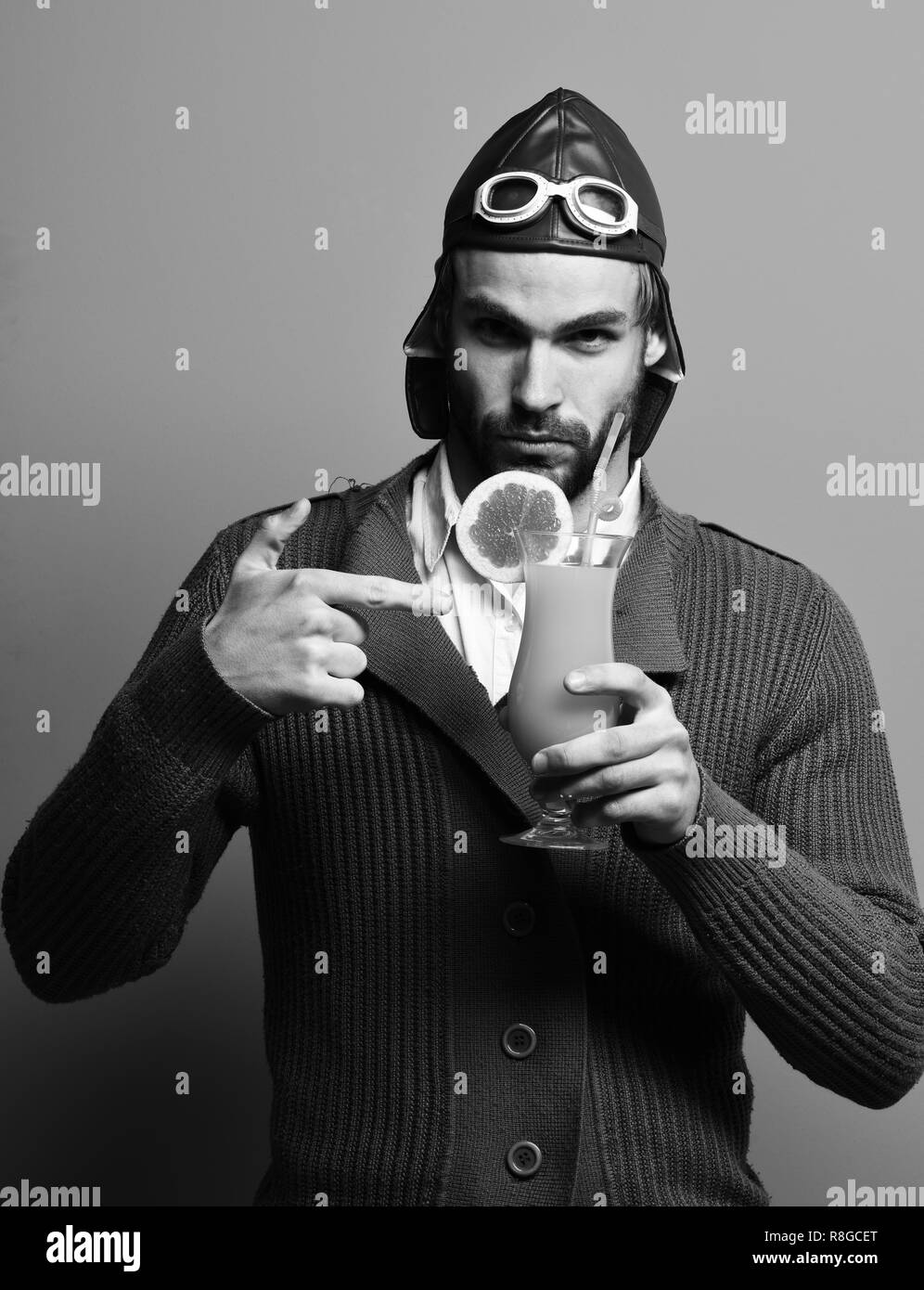 Man in blue sweater on Black and White Stock Photos & Images - Alamy