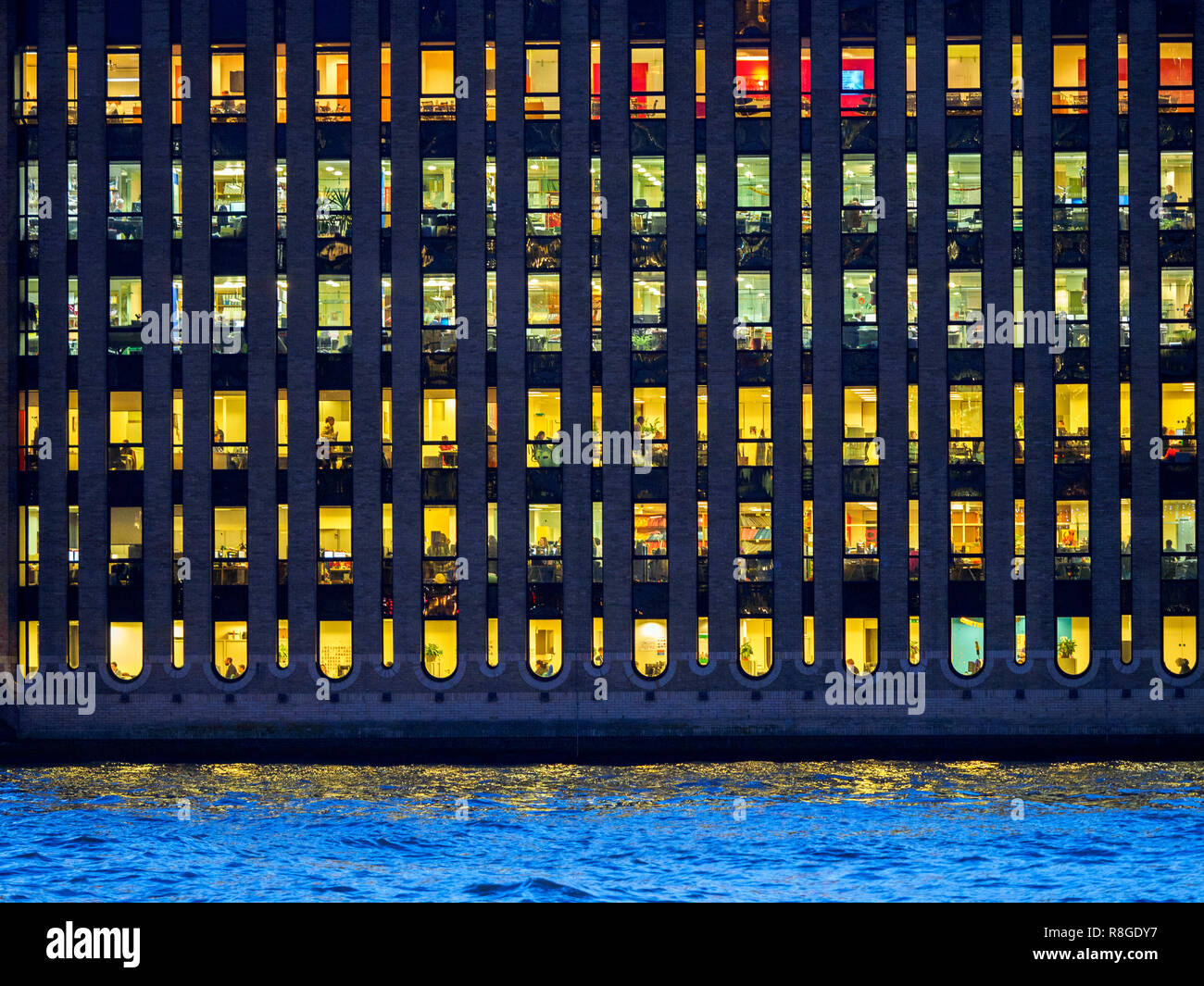 Detail of the Minerva House building at night - London, England Stock ...