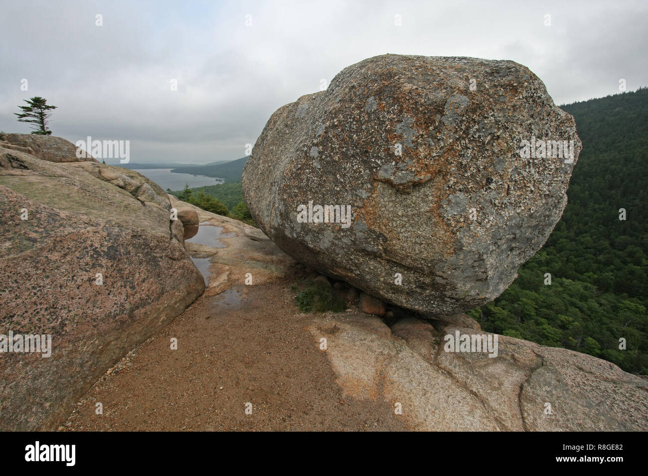 Bubble Rock, a precariously perched boulder in Acadia National Park ...