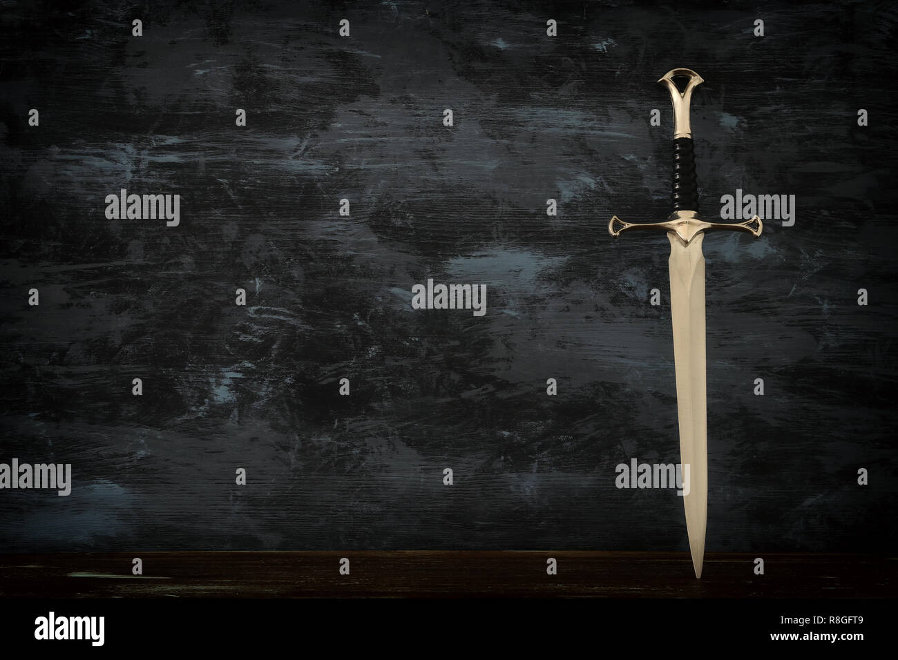 low key banner of silver sword. fantasy medieval period Stock Photo - Alamy