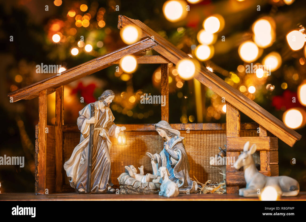 Christmas Manger scene with figurines including Jesus, Mary, Joseph and ...